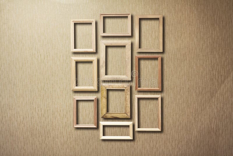 Photo frames on wall stock photo. Image of background - 208006574
