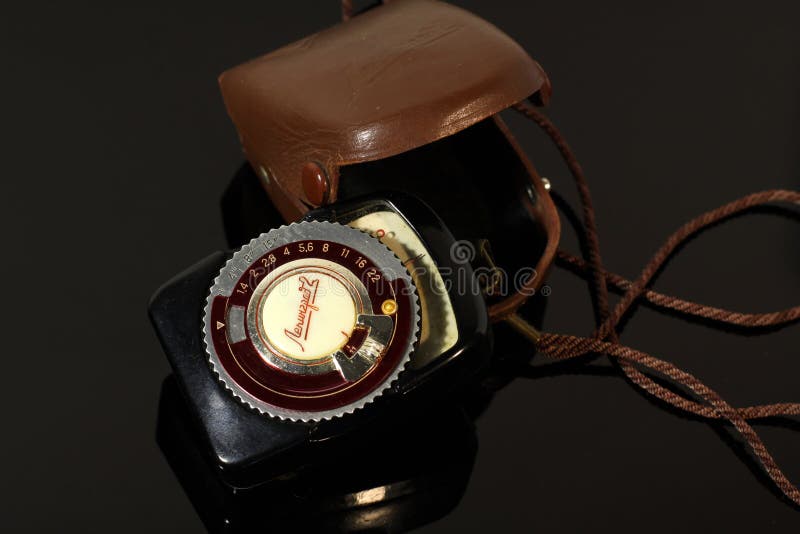 Old Photo Light Meter in a Case on a Mirror Table Editorial Photo ...