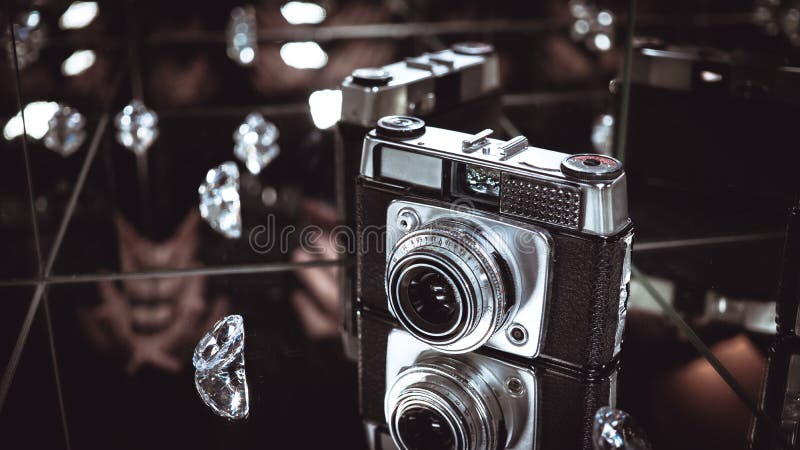Old Photography Camera in the Mirror Cube Reflection Stock Photo ...