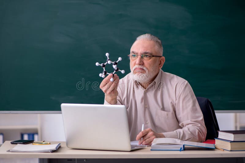 Old Male Physics Teacher in Front of Blackboard Stock Photo - Image of ...