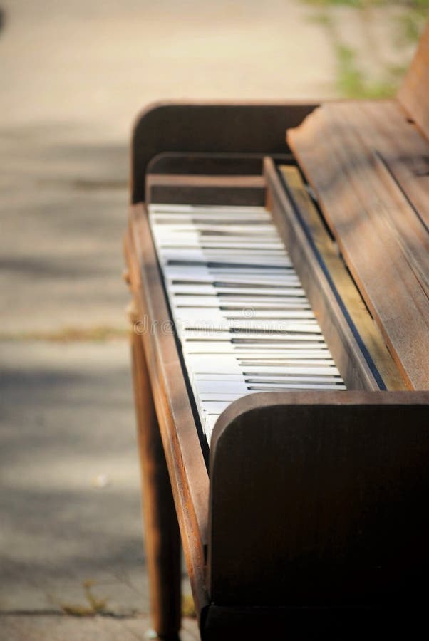 Old piano left on sidewalk stock photo. Image of sound - 93812574