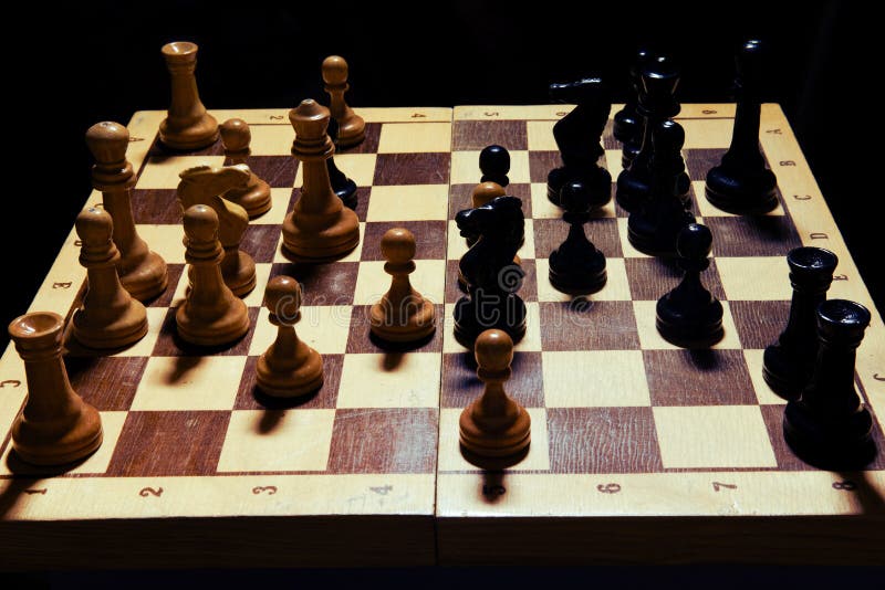 Old Pieces in a Middlegame Position on a Shabby Chessboard Stock Photo ...