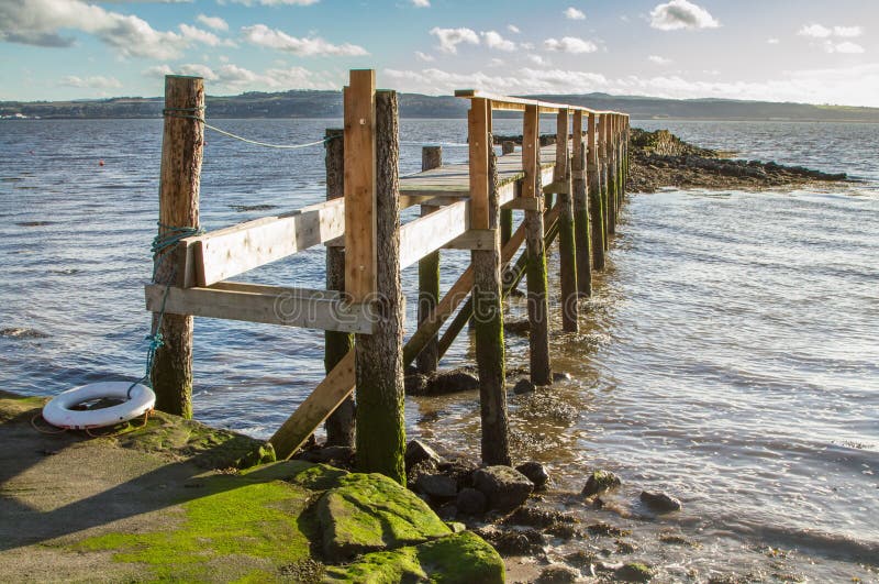 An old Pier in Scotland stock image. Image of state, closeup - 27844531
