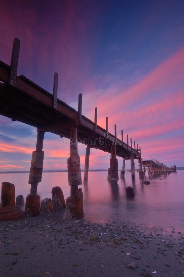 Old Pier at Sunset stock image. Image of dramatic, wooden - 1179819