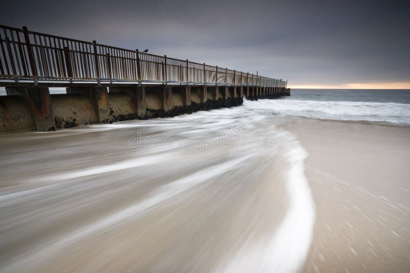 Old Pier Sunset Low Tide stock image. Image of water - 22280495