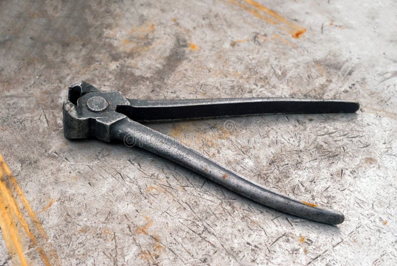 Old Pincers on a Metal Workbench Stock Image - Image of life, rusty ...