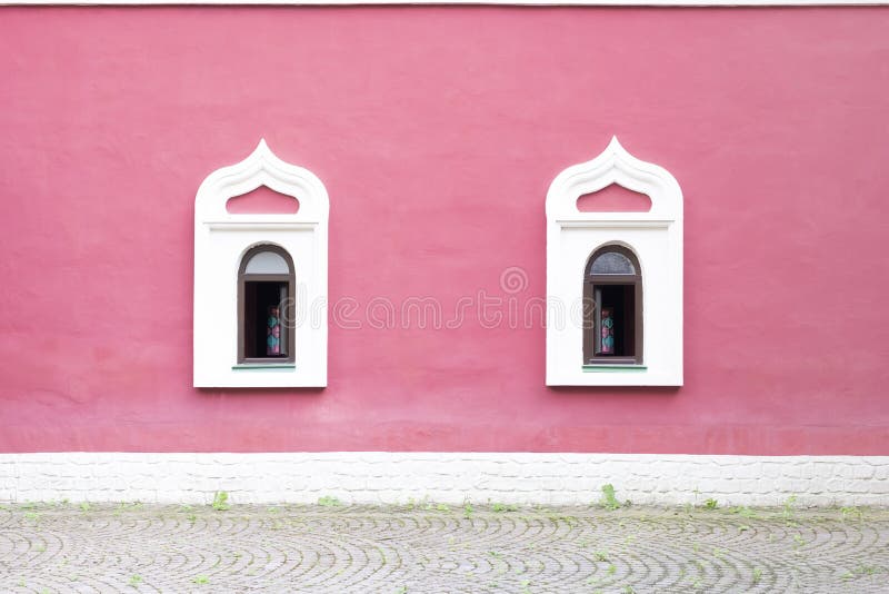 An Old Pink Facade with Two White Windows. Architectural Geometry Stock ...