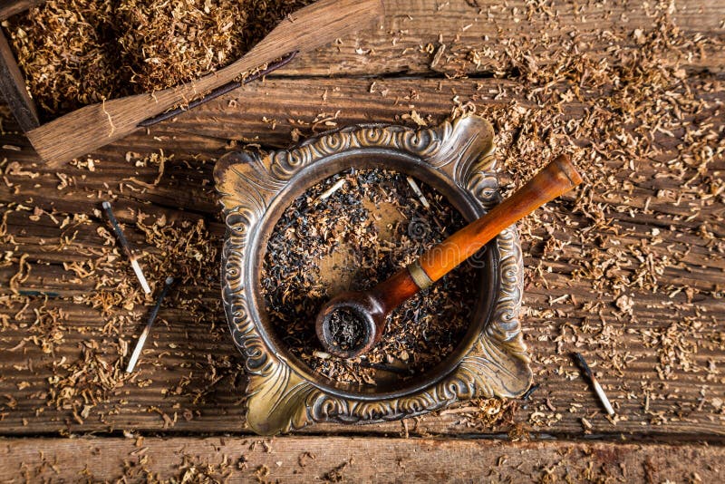 Old pipe inside of tobacco stock image. Image of pipe - 37095207