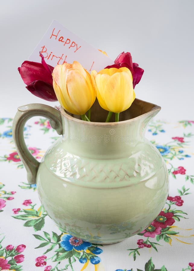 Old Pitcher with Flowers of Tulips Stock Photo - Image of tablecloth ...