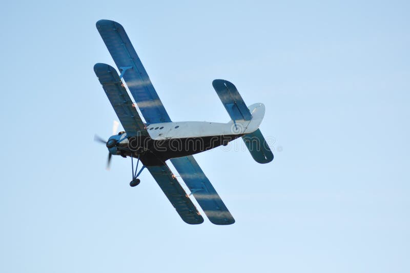Old Plane Flying Near the Trees Stock Image - Image of fashioned, blue ...