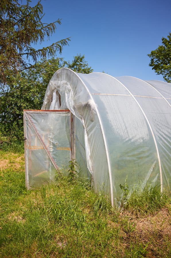 Old Plastic Greenhouse on an Organic Vegetable Farm Stock Photo - Image ...