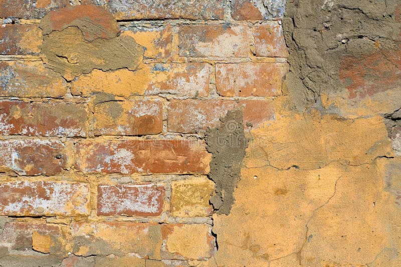 Old plaster on brick wall stock photo. Image of paint - 15359324