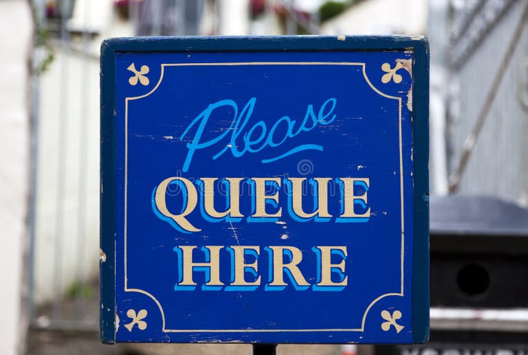 Old Please Queue here sign stock image. Image of demand - 20325055