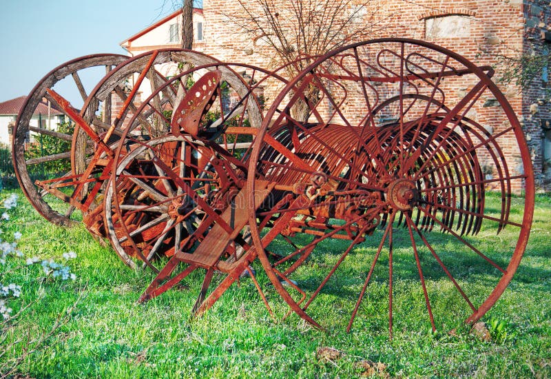 Old plow on green grass stock image. Image of plow, agriculture - 45391455