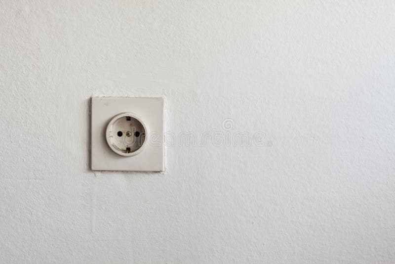 Old Plug in White Wall stock photo. Image of connection - 91287036