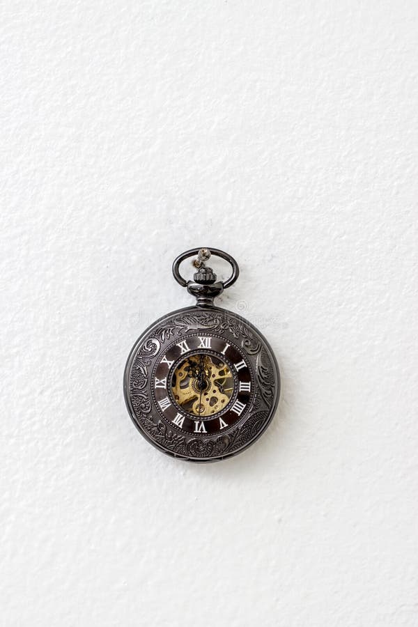 Old Pocket Watch Hanging on the White Wall Stock Photo - Image of clock ...