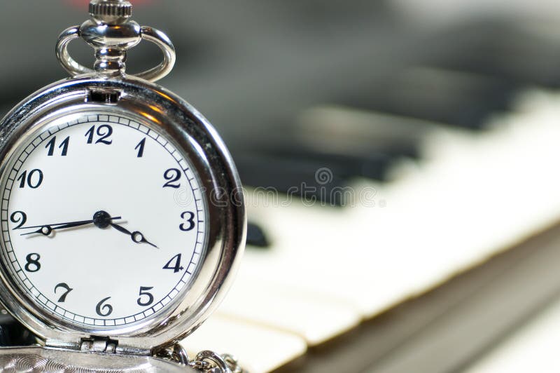 Old Pocket Watch on Piano Keyboard. Stock Photo - Image of piano, aged ...