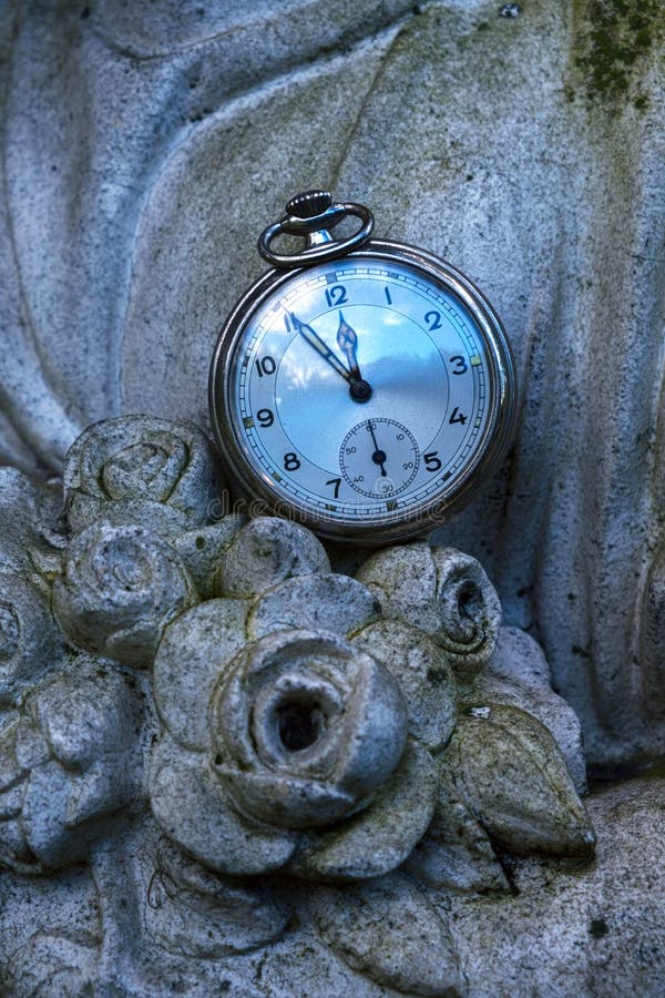 Old Pocket Watch at a Stone Sculpture Stock Photo - Image of stone ...