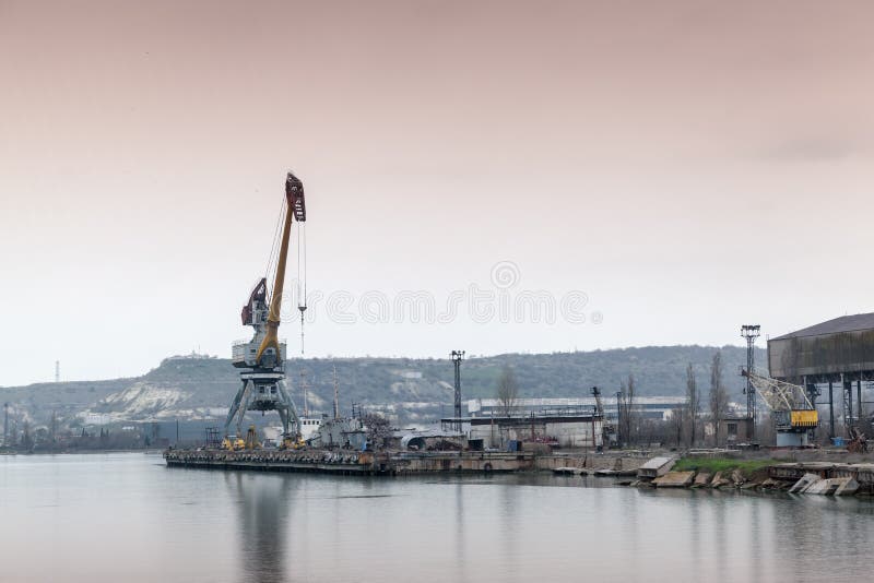 Old Port Crane and Harbor Structures Stock Image - Image of coastline ...
