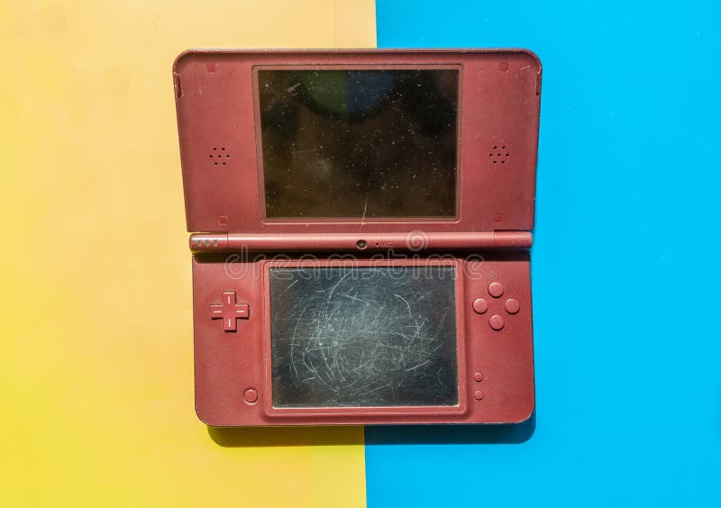 Old Portable Console on Blue and Yellow Background Stock Image - Image ...