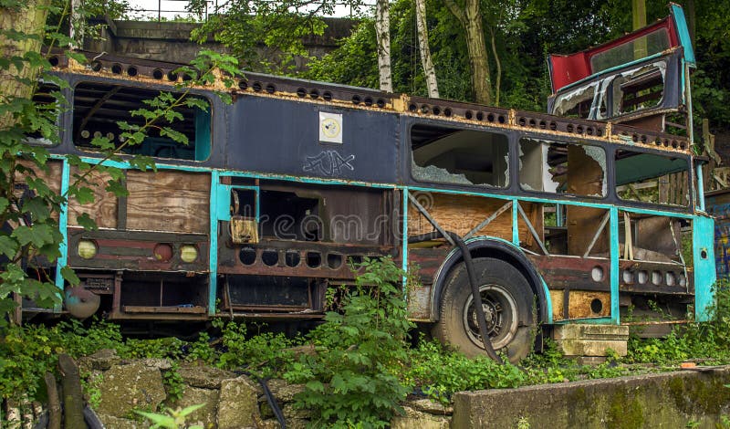 Old, Post Apocalyptic Looking Decayed And Rotting Bus In The Woods ...