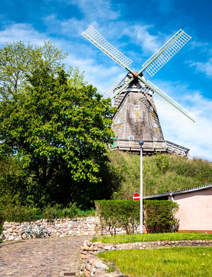 Old post mill in Germany stock photo. Image of rural - 220433860