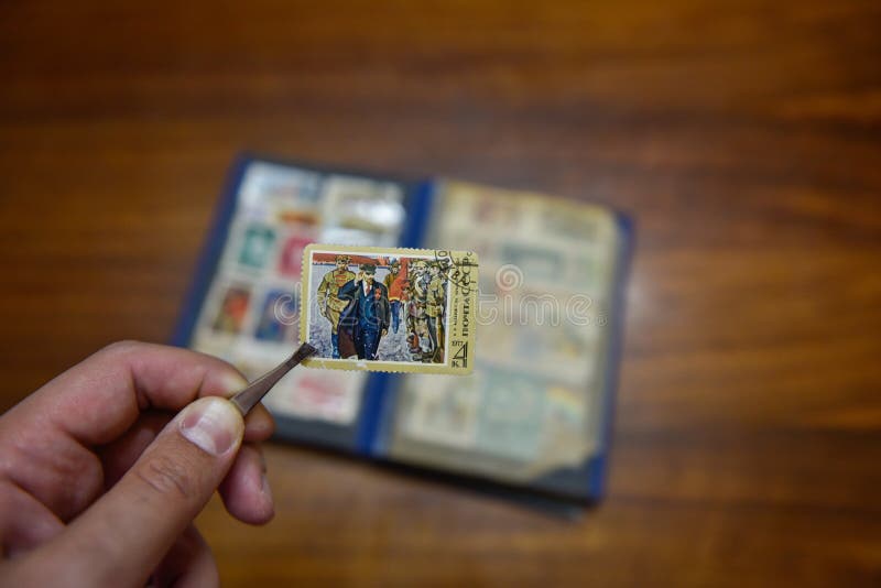 Old Postage Stamp on the Table Editorial Photography - Image of fabric ...