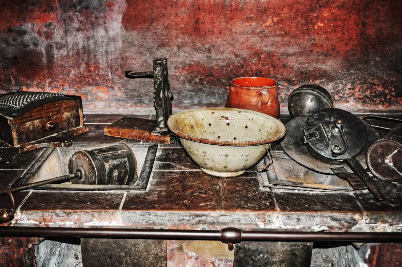 Old Pots and Dishes in a Rustic Kitchen Stock Photo - Image of hook ...