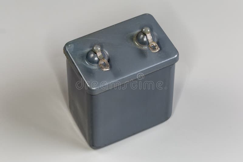 Old Power Paper Capacitor in Rectangular Housing on Gray Surface Stock ...