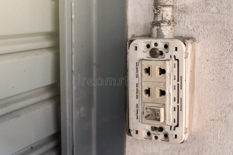 Old power plug on the wall stock photo. Image of broken - 116650430