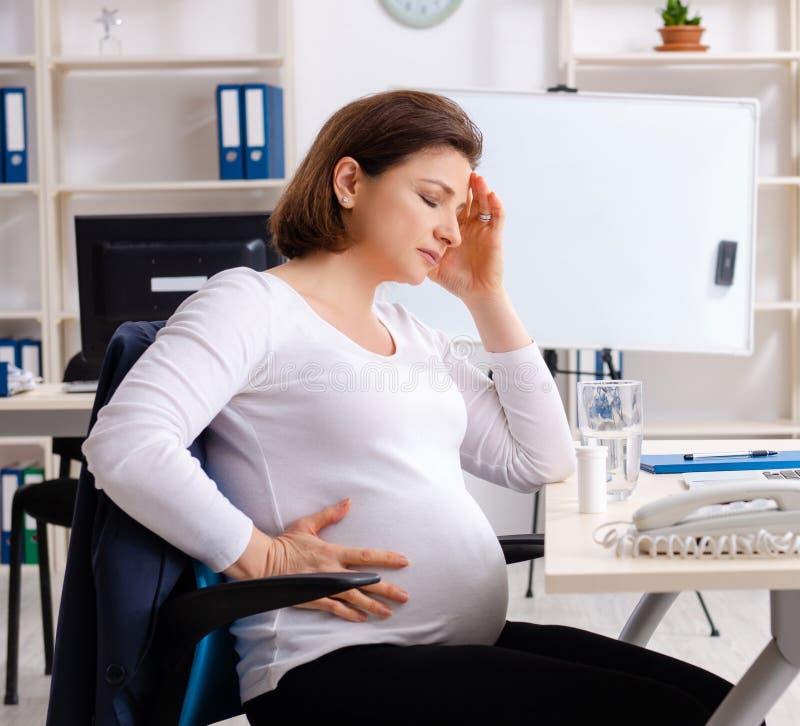 Old Pregnant Woman Working in the Office Stock Photo - Image of ...
