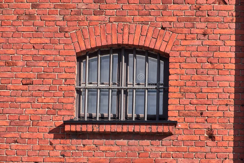 The Old Prison Window on the Red Brick Wall Stock Image - Image of ...