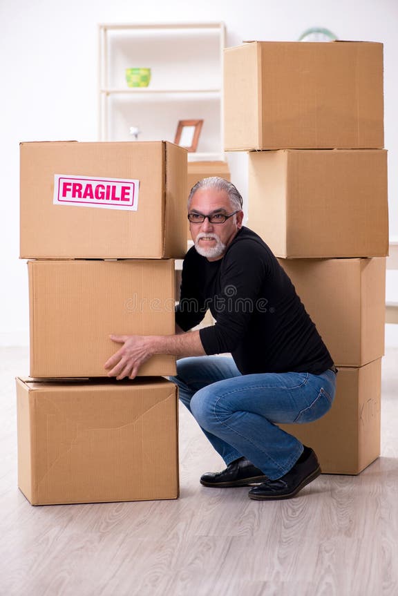 Old Male Professional Mover Doing Home Relocation Stock Photo - Image ...