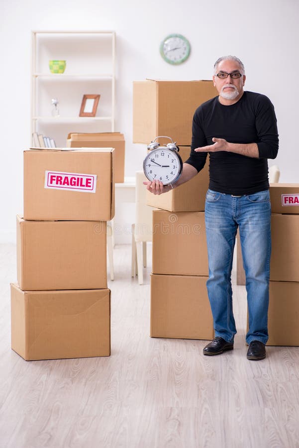 Old Male Professional Mover Doing Home Relocation Stock Photo - Image ...