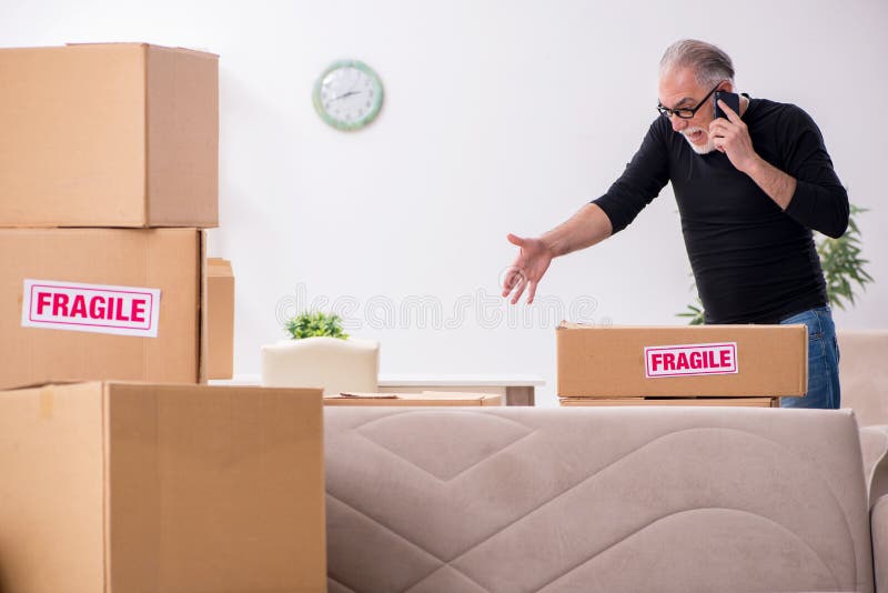 Old Male Professional Mover Doing Home Relocation Stock Photo - Image ...