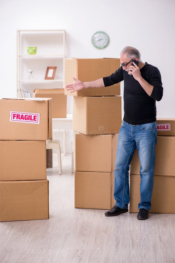 Old Male Professional Mover Doing Home Relocation Stock Photo - Image ...