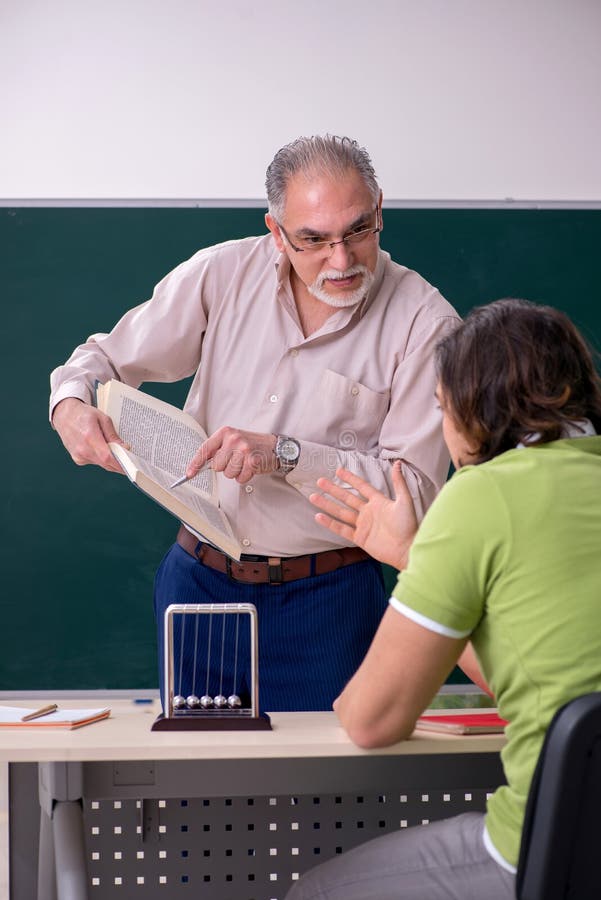 Old Professor Physicist and Young Student in the Classroom Stock Photo ...