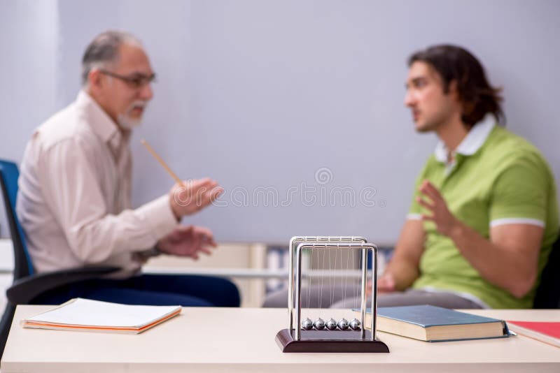 Old Professor Physicist and Young Student in the Classroom Stock Image ...