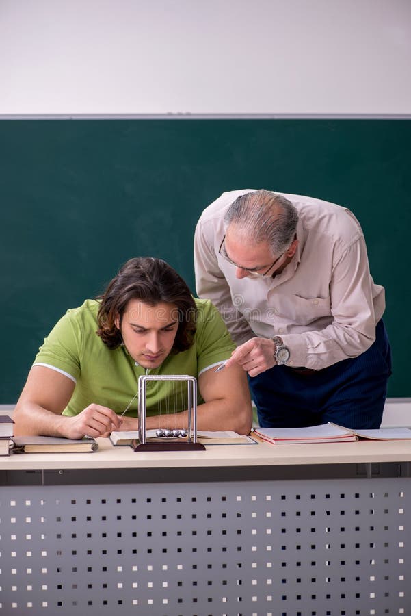 Old Professor Physicist and Young Student in the Classroom Stock Image ...