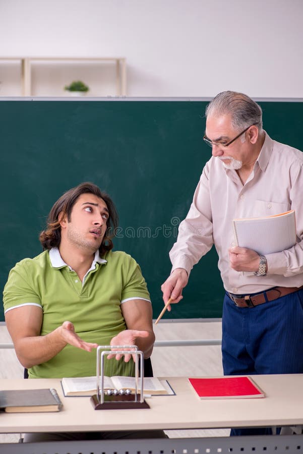 Old Professor Physicist and Young Student in the Classroom Stock Image ...