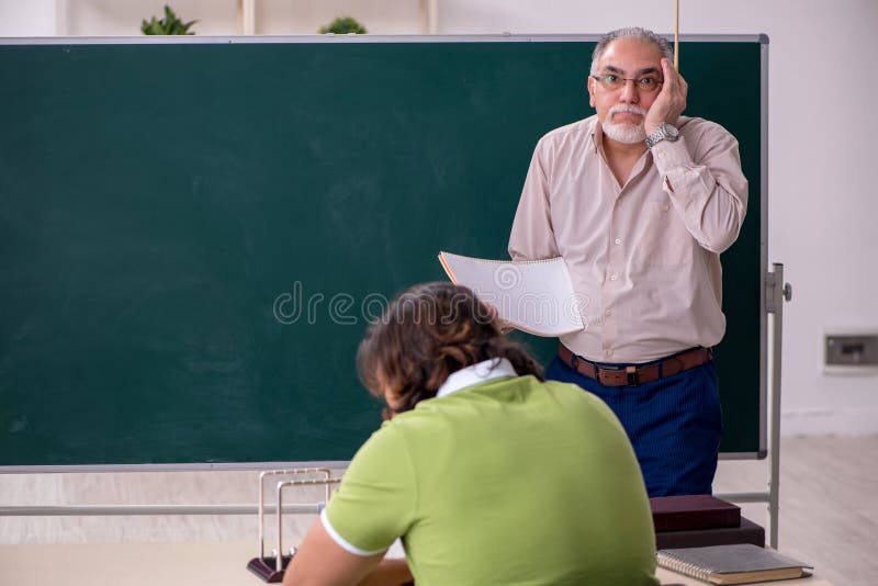 Old Professor Physicist and Young Student in the Classroom Stock Photo ...