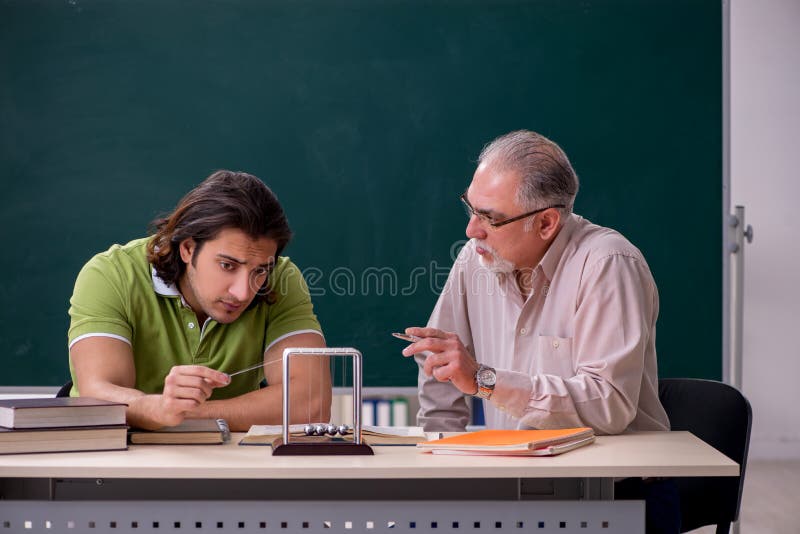 Old Professor Physicist and Young Student in the Classroom Stock Photo ...