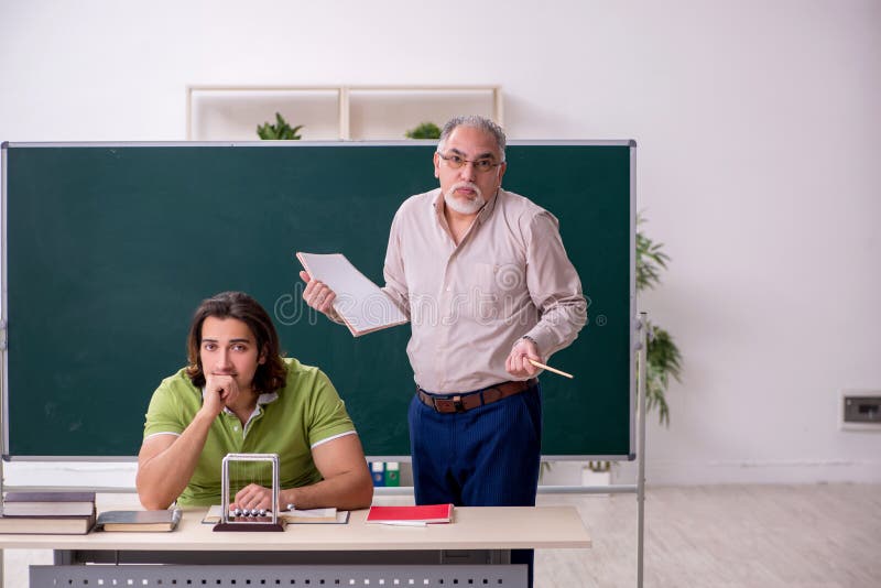 Old Professor Physicist and Young Student in the Classroom Stock Photo ...