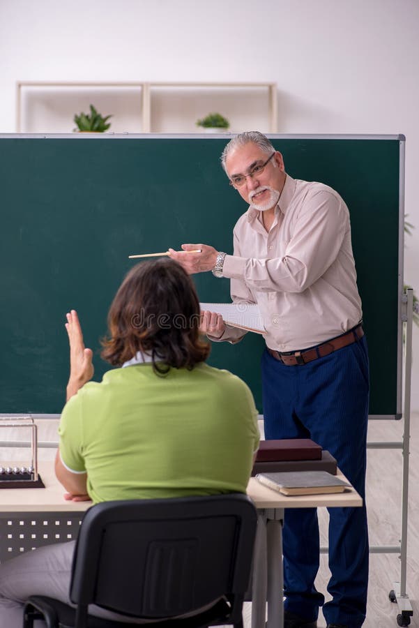 Old Professor Physicist and Young Student in the Classroom Stock Photo ...