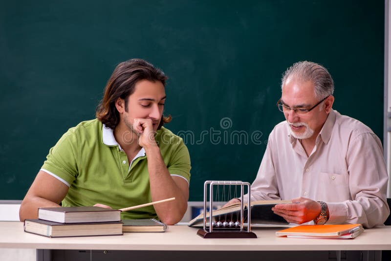 Old Professor Physicist and Young Student in the Classroom Stock Image ...