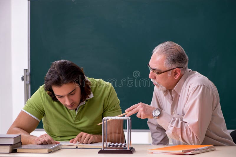 Old Professor Physicist and Young Student in the Classroom Stock Photo ...