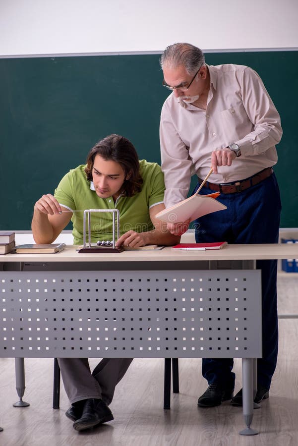 Old Professor Physicist and Young Student in the Classroom Stock Image ...