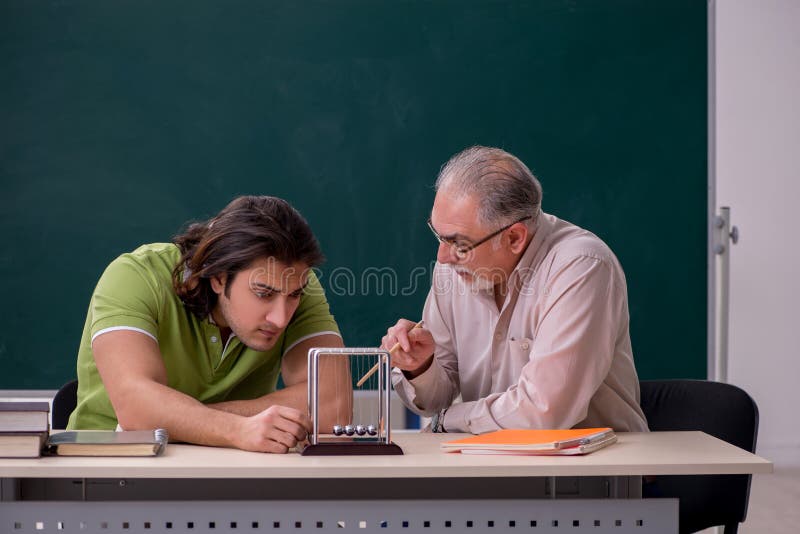 Old Professor Physicist and Young Student in the Classroom Stock Photo ...