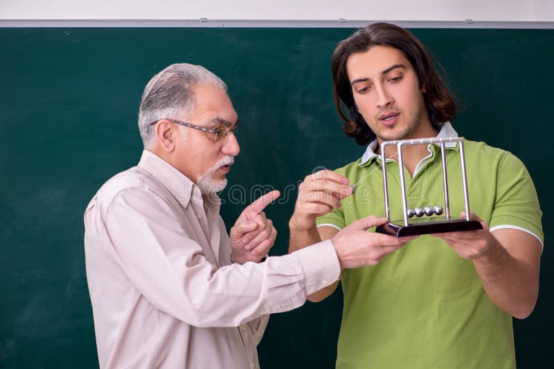 Old Professor Physicist and Young Student in the Classroom Stock Photo ...
