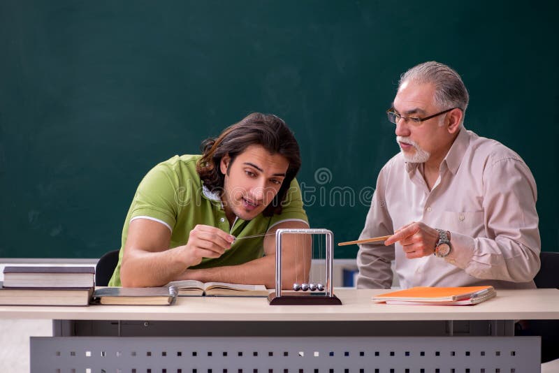 Old Professor Physicist and Young Student in the Classroom Stock Photo ...